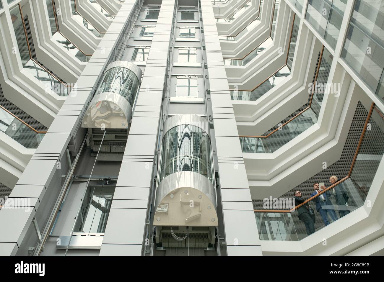 Image of high modern office building with elevators Stock Photo - Alamy