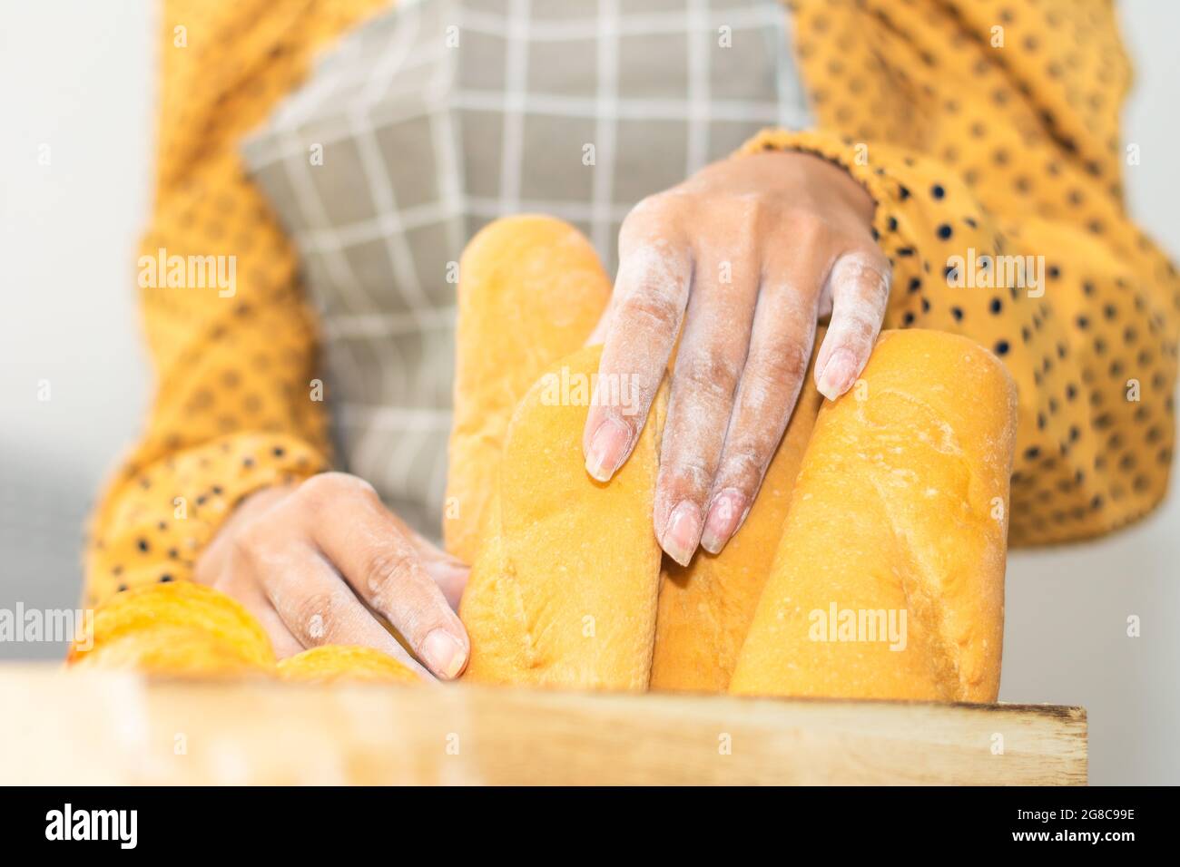 Fresh baguette in bucket hi-res stock photography and images - Alamy
