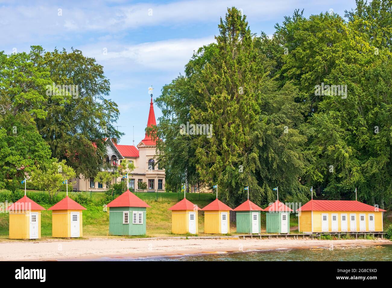 Beach with beach cabins at Hjo city in Sweden Stock Photo - Alamy