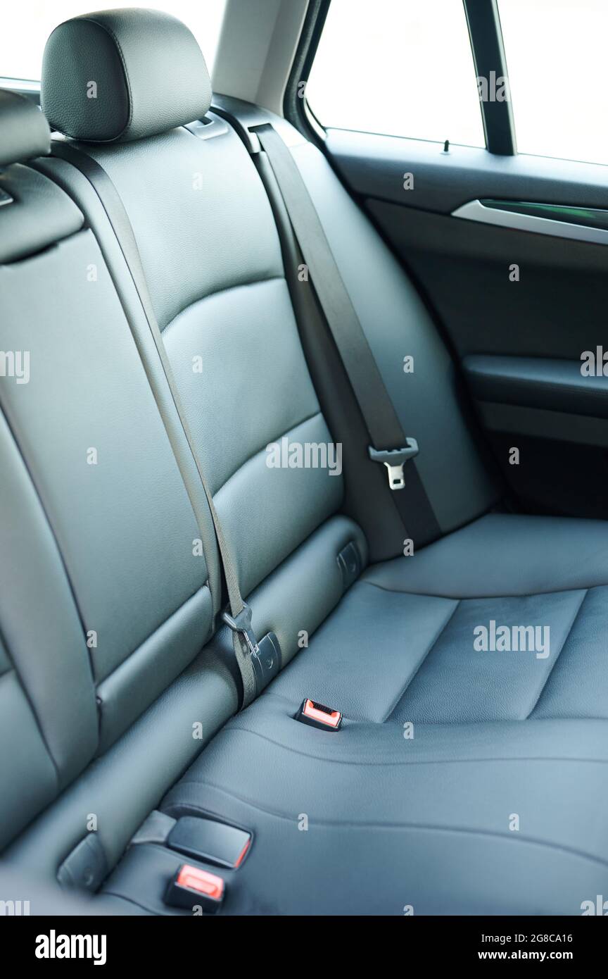 Clean comfortable leather back car seat close up view Stock Photo - Alamy