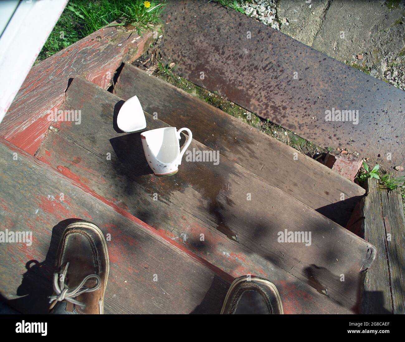 Man standing on broken glass hi-res stock photography and images - Alamy