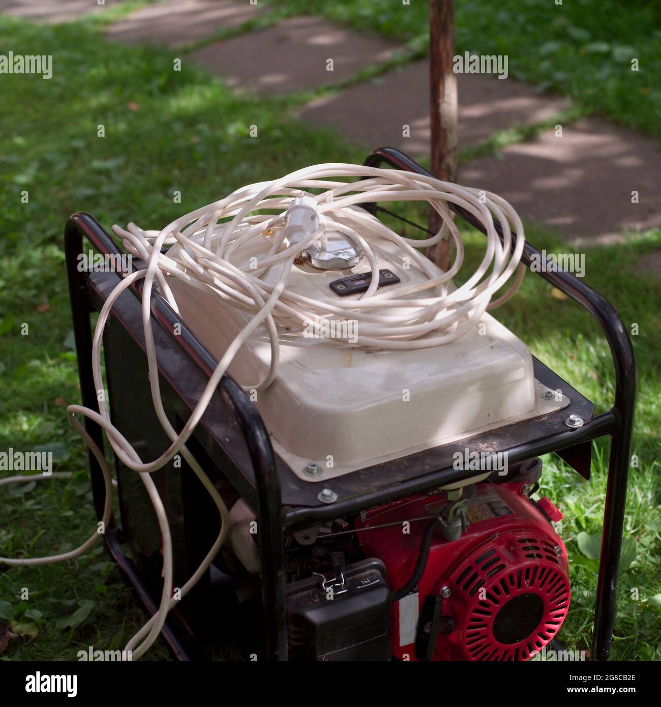 Portable power generator in a garden, summertime outdoor shot Stock ...