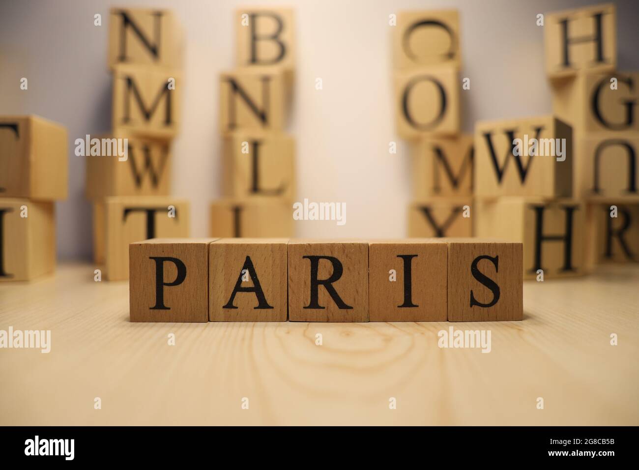 The word Paris was created from wooden letter cubes. Cities and words ...