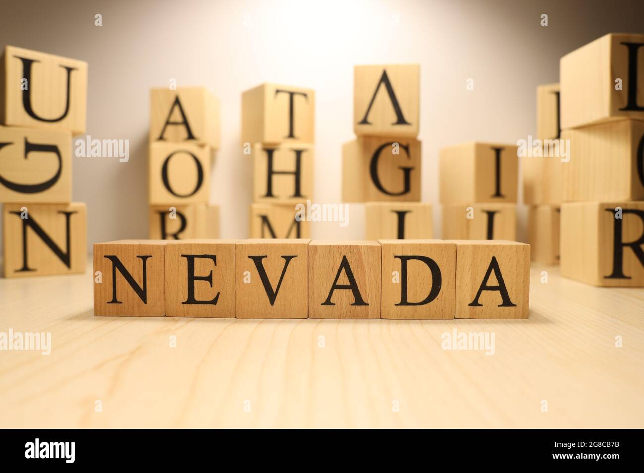 The word Nevada was created from wooden letter cubes. Cities and words ...