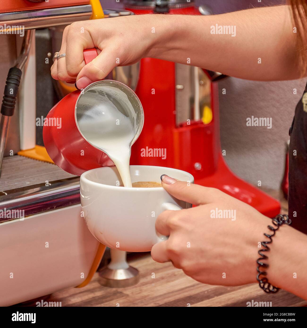 cafe worker making coffee on professional coffee maker close up, can be ...