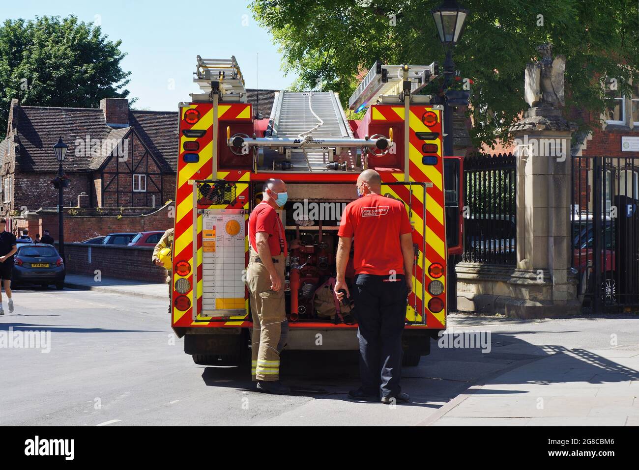 Fire fighters by a Fire engine on an emergency callout near county hall ...