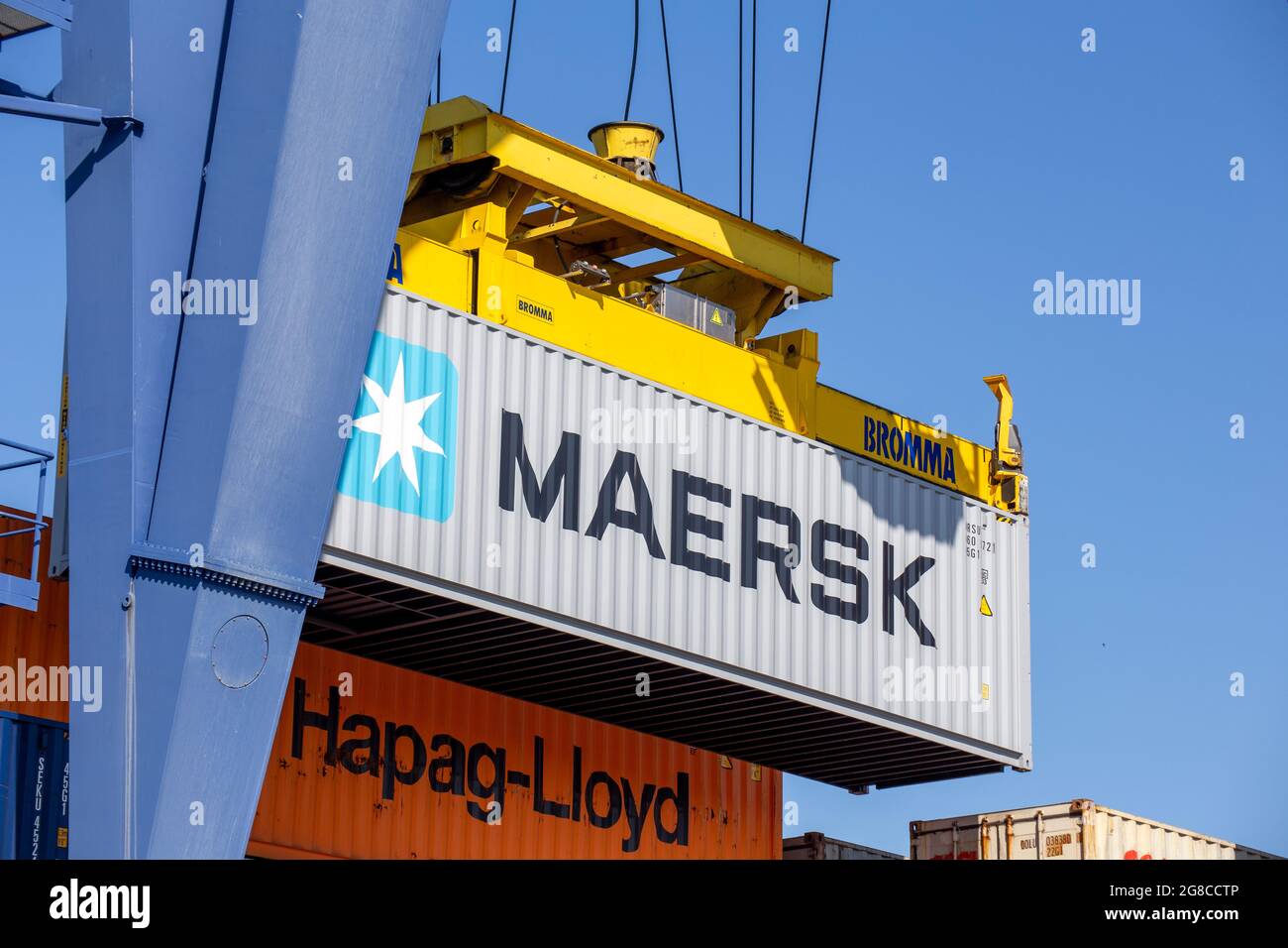 A Maersk Line container being loaded at the port of Mannheim (Germany ...