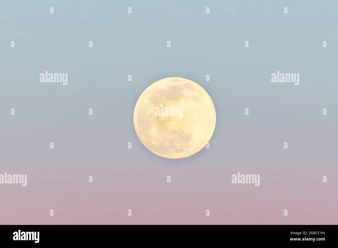Full moon on sunset sky, close-up. Pink and blue, dreamlike moon Stock ...