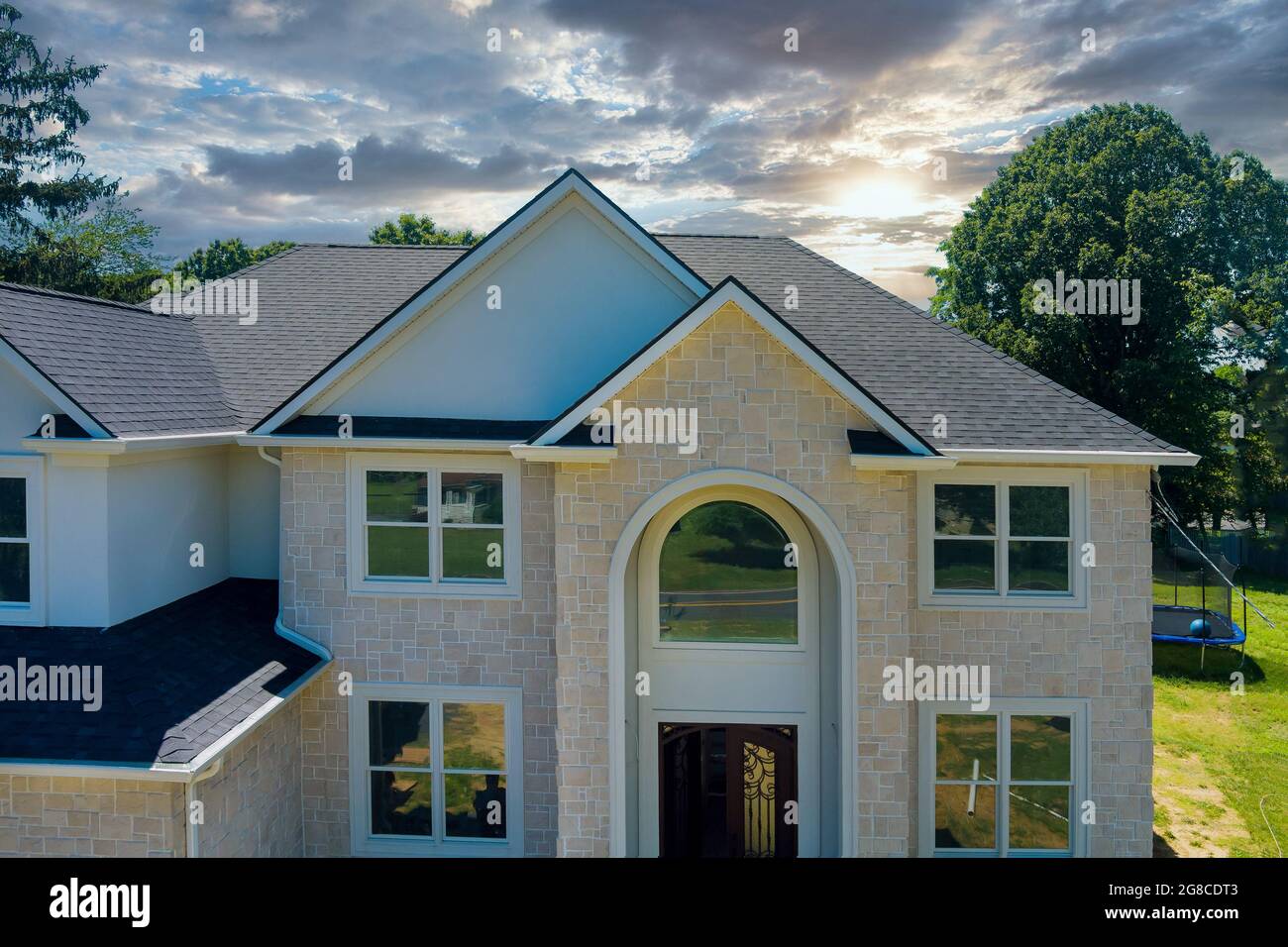 Rooftop in a new home constructed showing asphalt shingles multiple ...