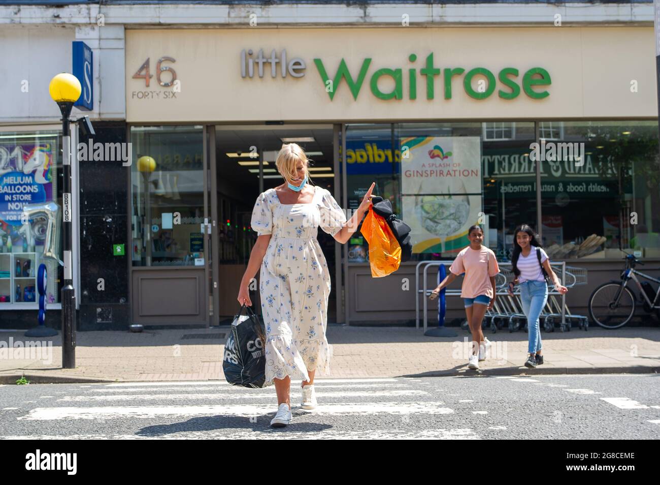 Amersham, Buckinghamshire, UK. 19th July, 2021. Shoppers leaving ...