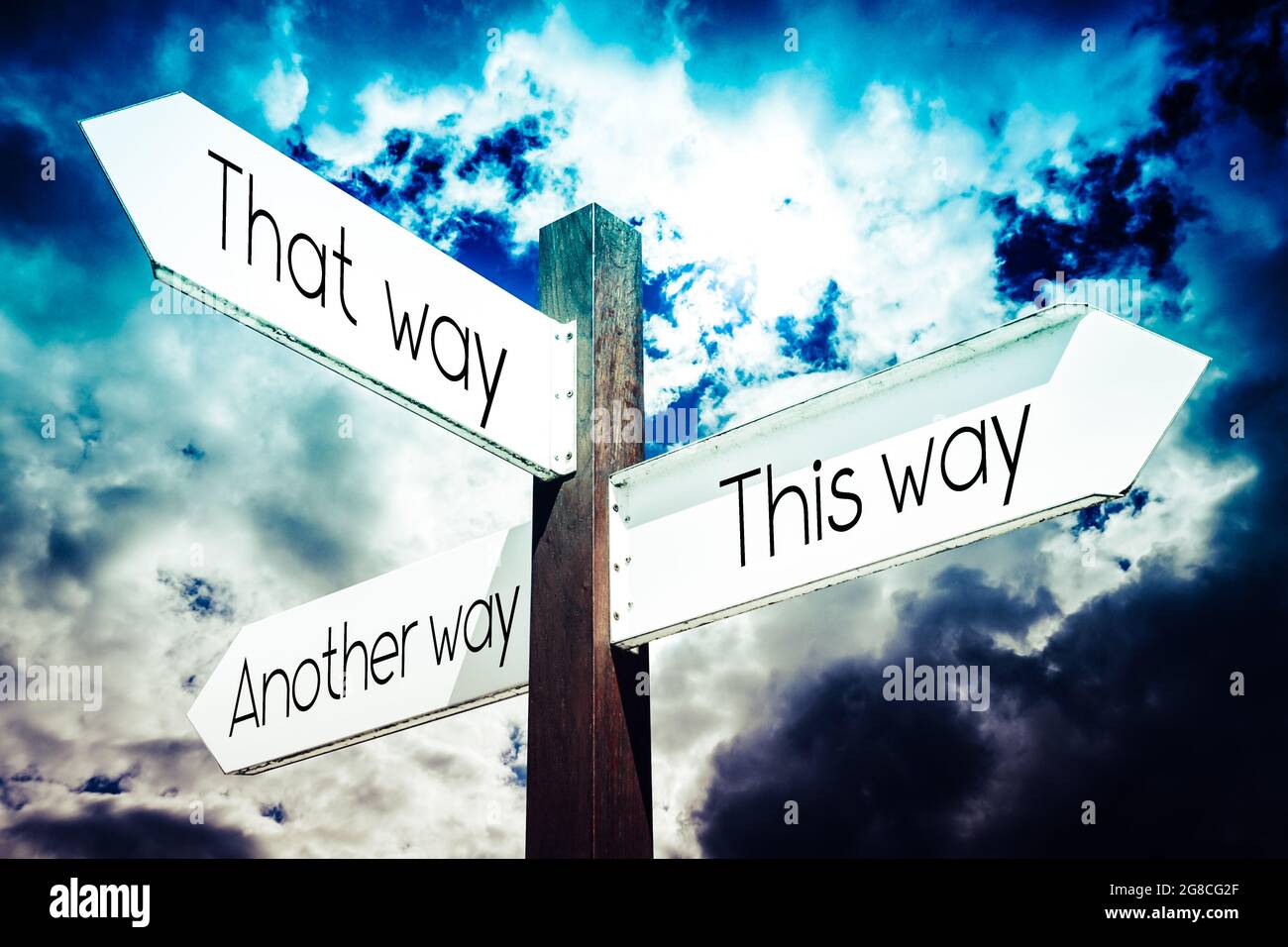 This way, that way, another way concept - signpost with three arrows ...