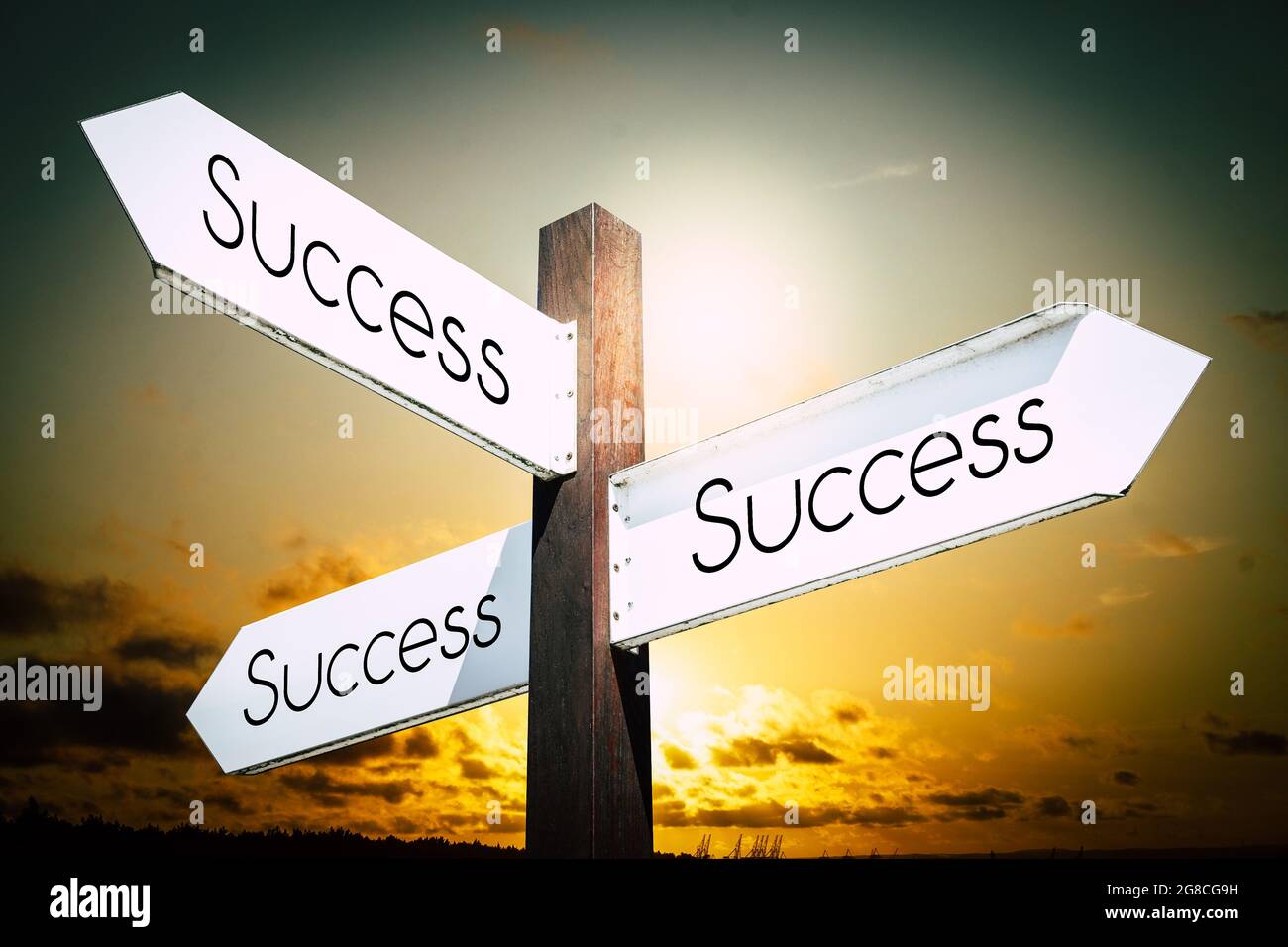 Success concept - signpost with three arrows Stock Photo - Alamy
