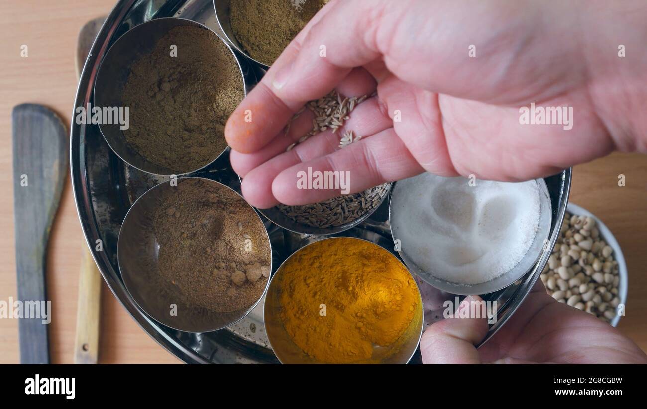 Top view of various Indian spices in metal containers Stock Photo - Alamy