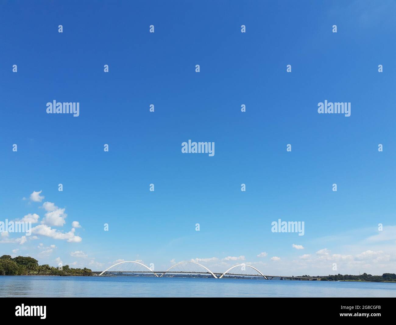 BLUE SKY and jk white bridge Stock Photo - Alamy