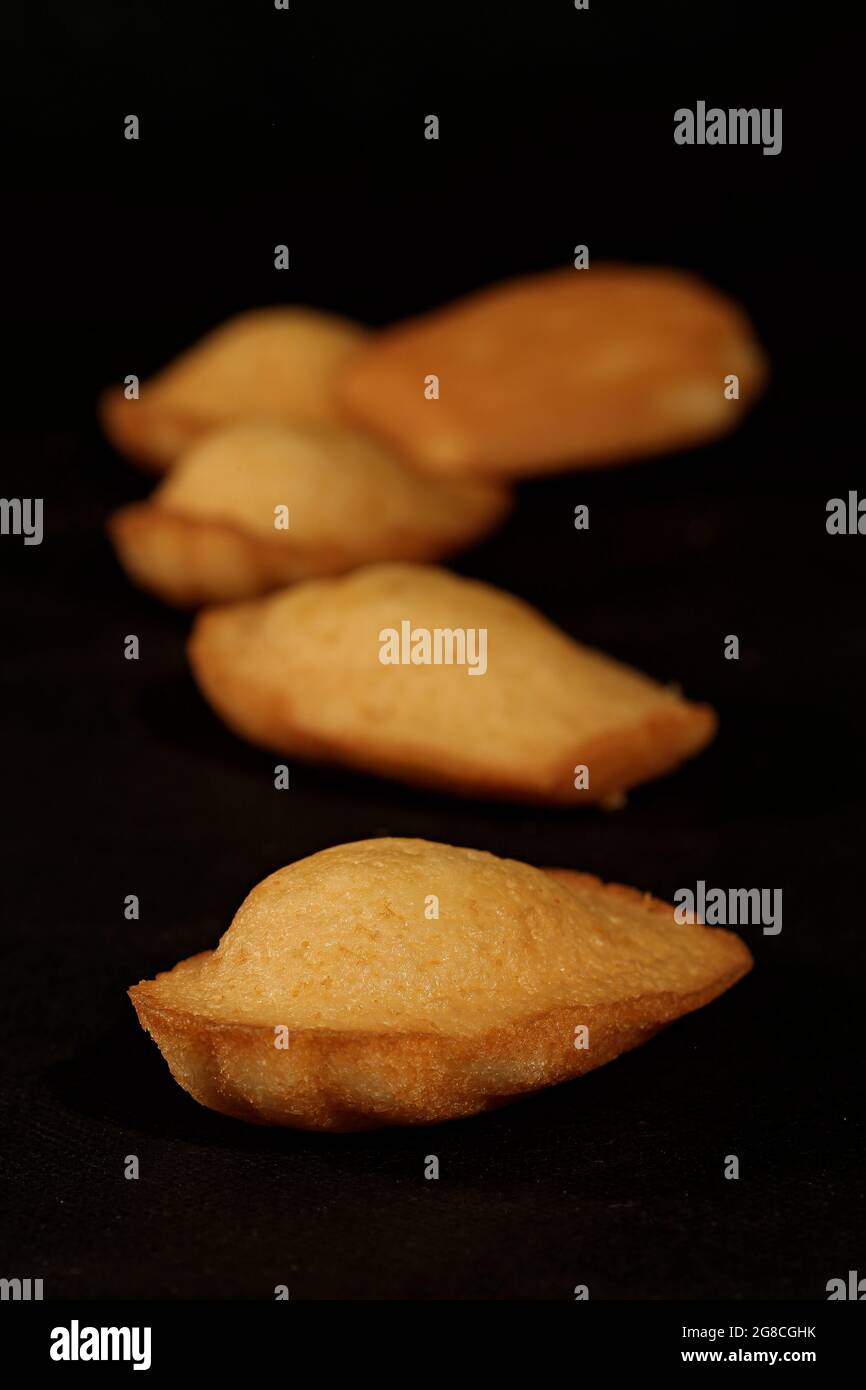 madeleine, french pastry, homemade french shell shaped cookie, on a ...