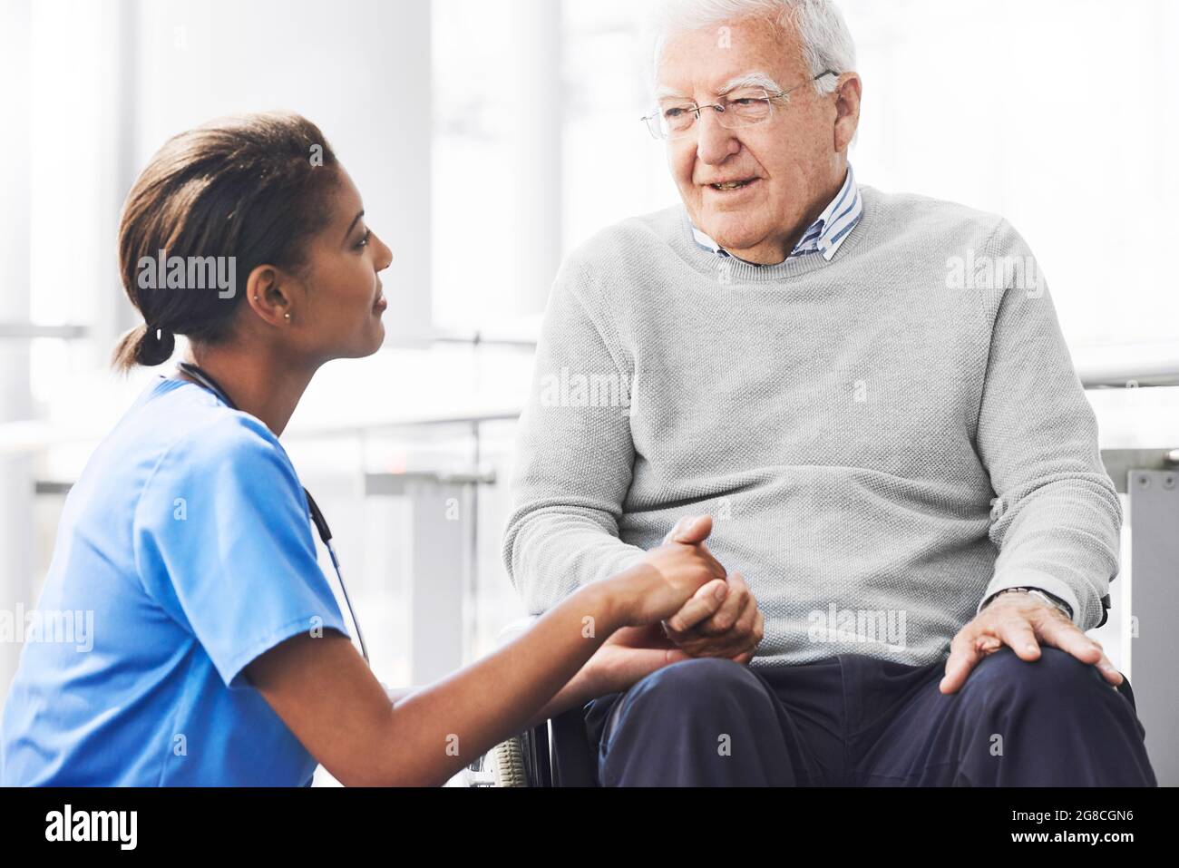 Caregiving adults hi-res stock photography and images - Alamy
