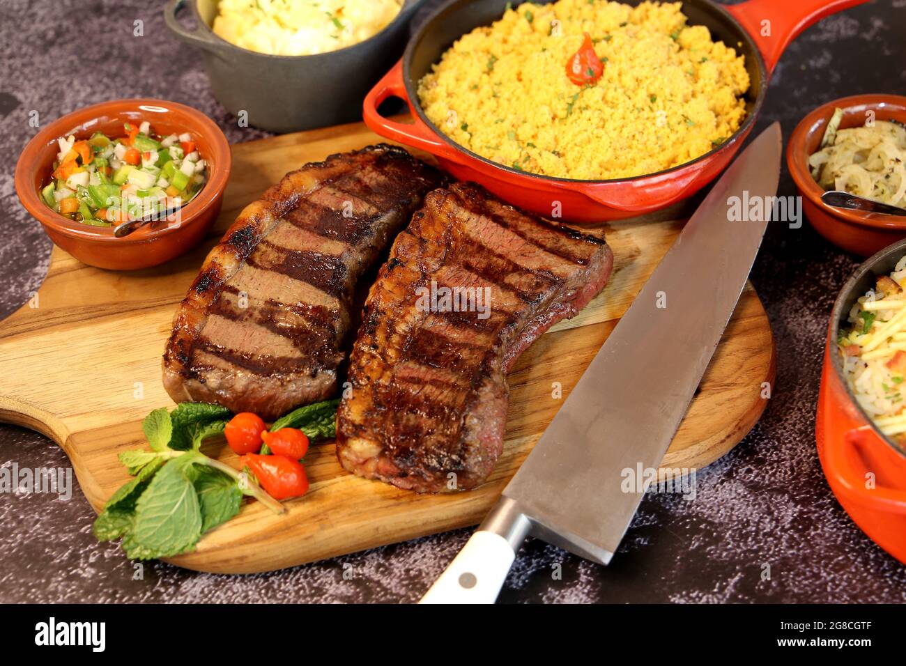 Picanha. Brazilian steak grilled in barbecue. Two slices of Picanha ...