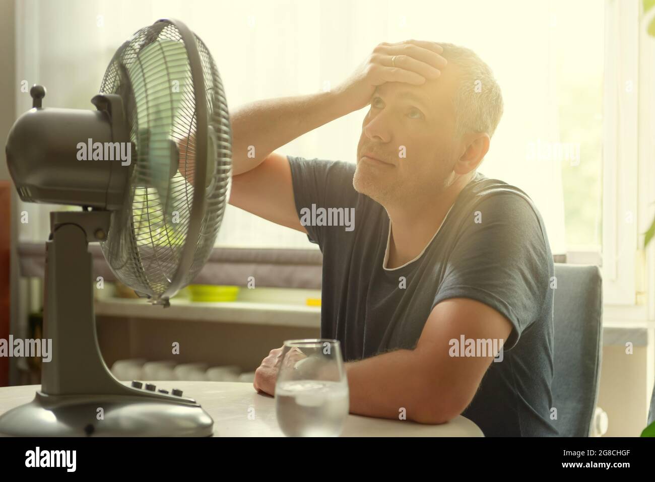 Cooling glass man hi-res stock photography and images - Alamy