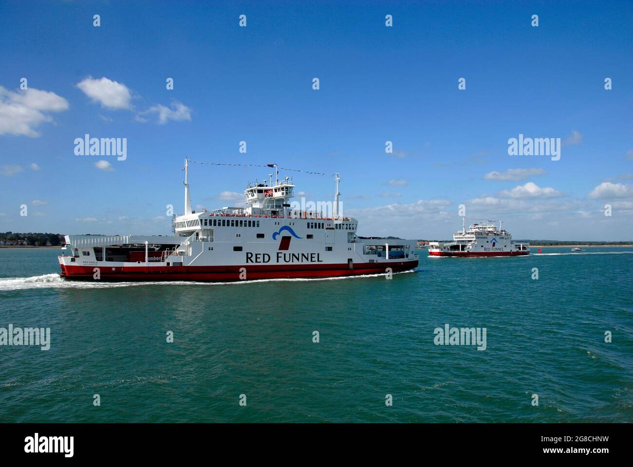 Two Red Funnel line ferries passing each other on Southampton Water ...