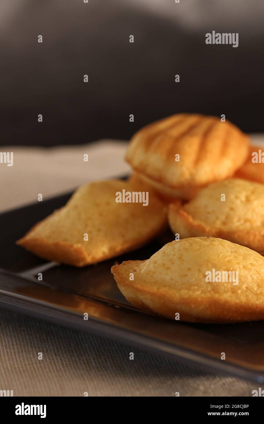 madeleine, french pastry, homemade french shell shaped cookie, on a ...