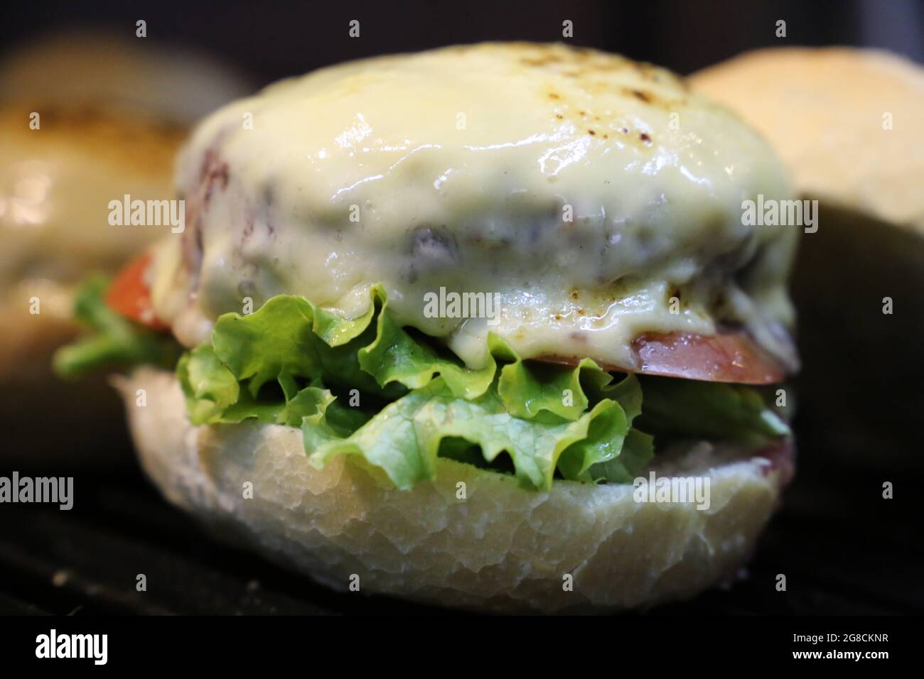 X-Salada. Brazilian hamburger made in barbecue grill Stock Photo - Alamy