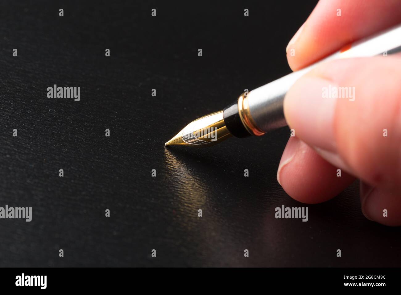 Holding fountain pen hi-res stock photography and images - Alamy