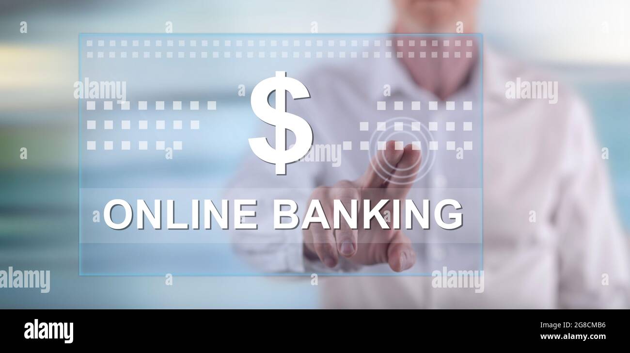 Man touching an online banking concept on a touch screen with his ...
