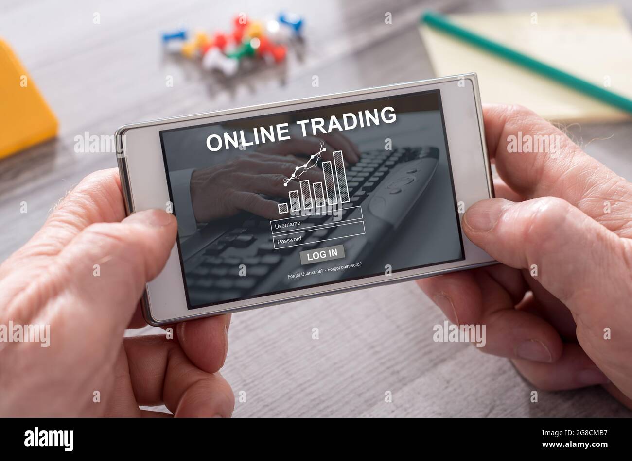 Online trading concept on mobile phone Stock Photo - Alamy