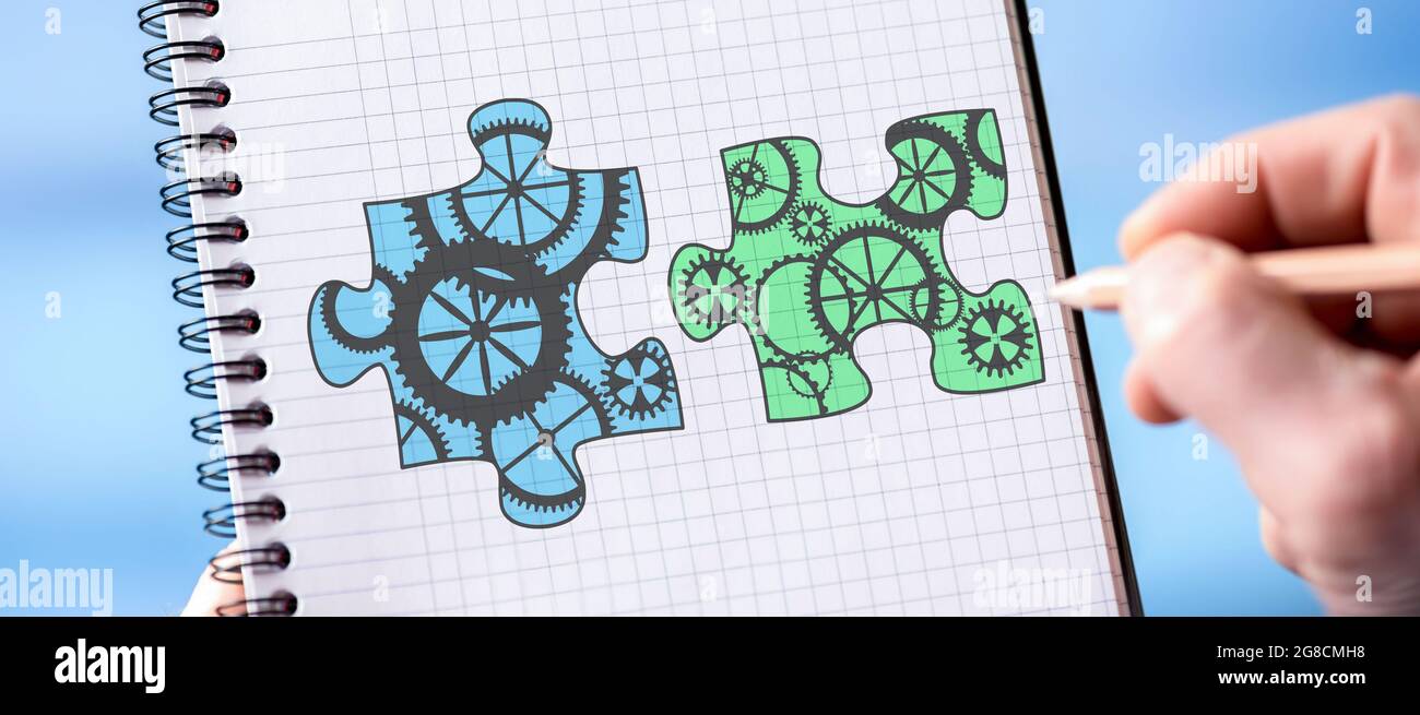 Hand drawing partnership puzzle on hi-res stock photography and images ...