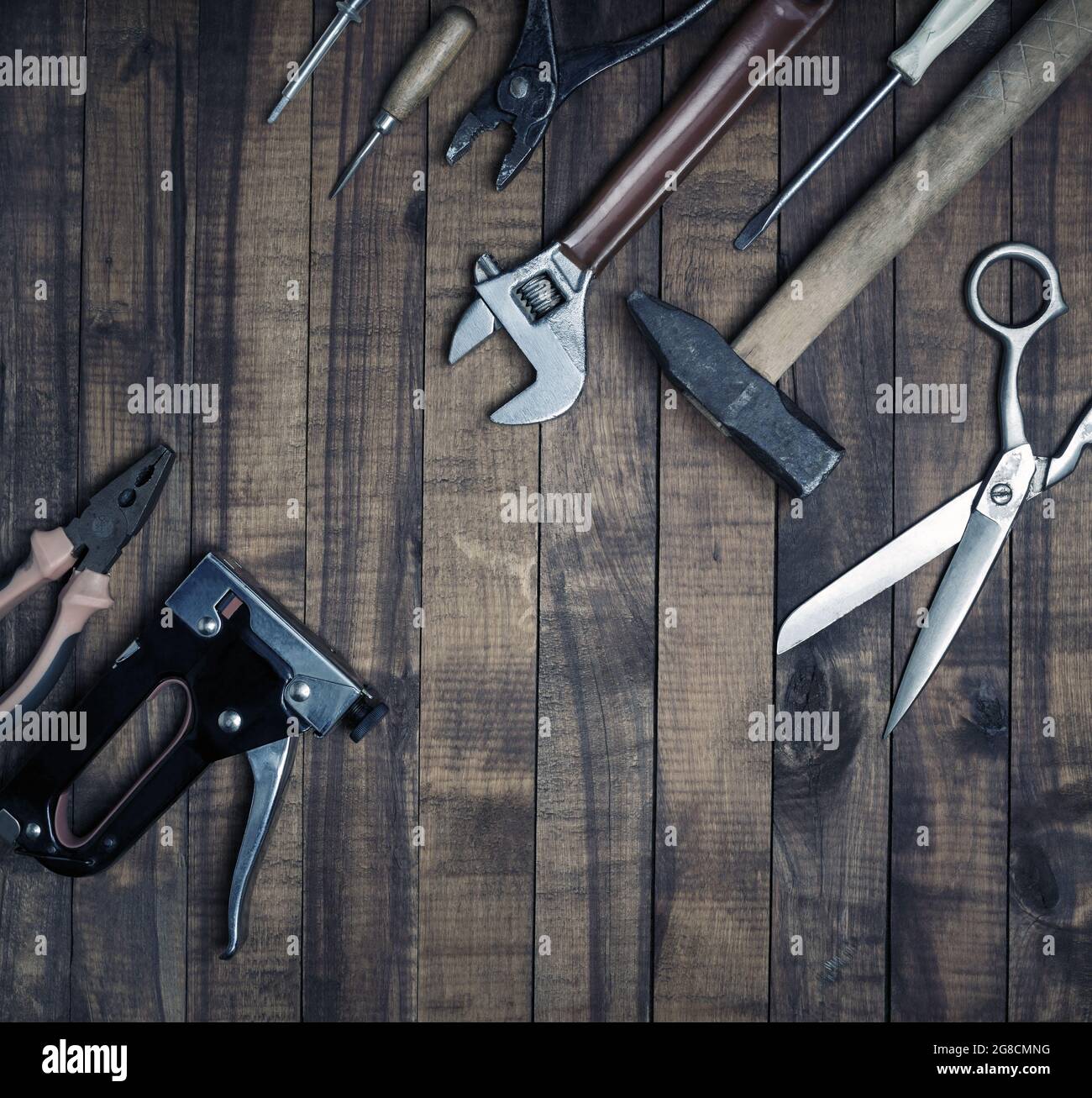 Old vintage tools on wood table background. Flat lay Stock Photo - Alamy