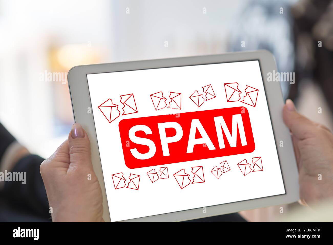 Tablet screen displaying a spam concept Stock Photo - Alamy