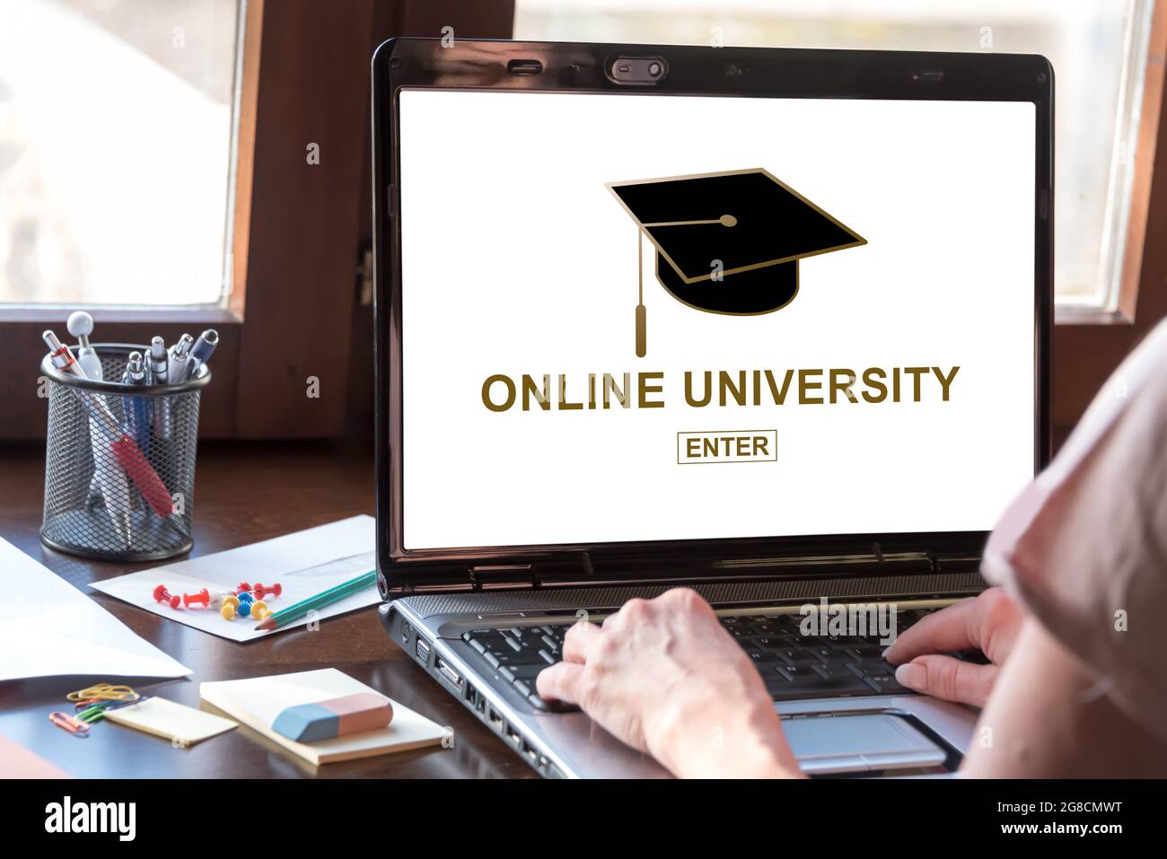 Laptop screen displaying an online university concept Stock Photo - Alamy