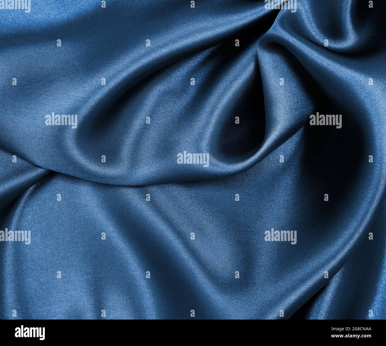 Smooth elegant blue silk or satin luxury cloth texture can use as ...