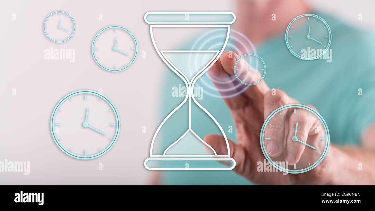 Man touching a time management concept on a touch screen with his ...
