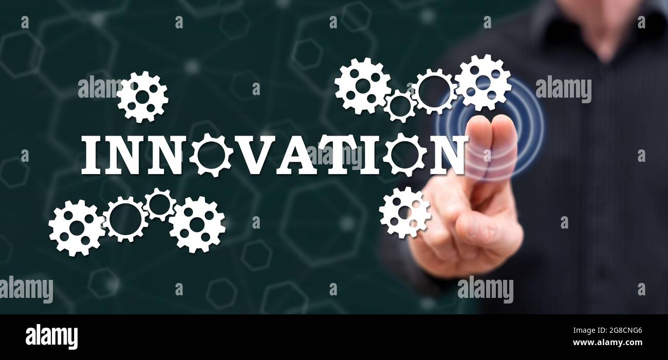 Man touching an innovation concept on a touch screen with his fingers ...