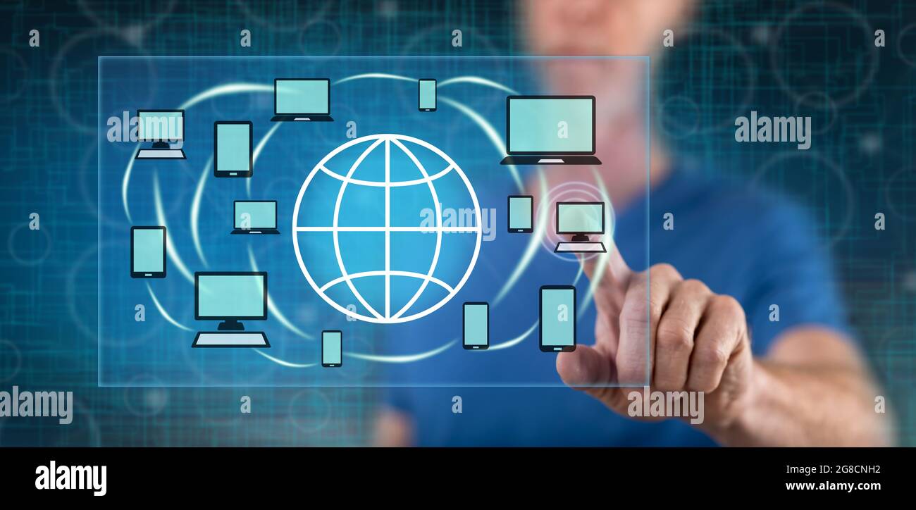 Man touching a global connection concept on a touch screen with his ...