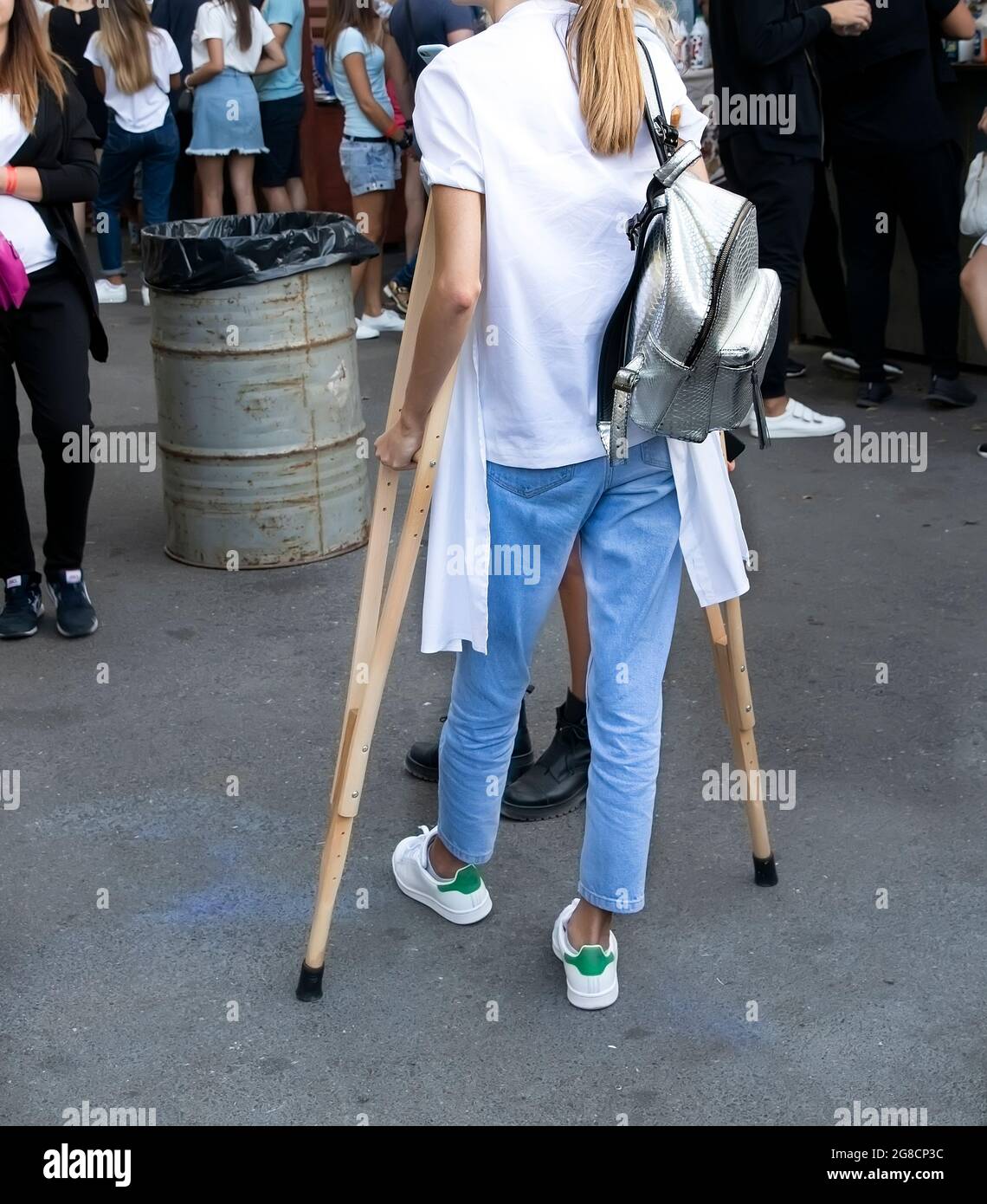 Girl on crutches hi-res stock photography and images - Alamy