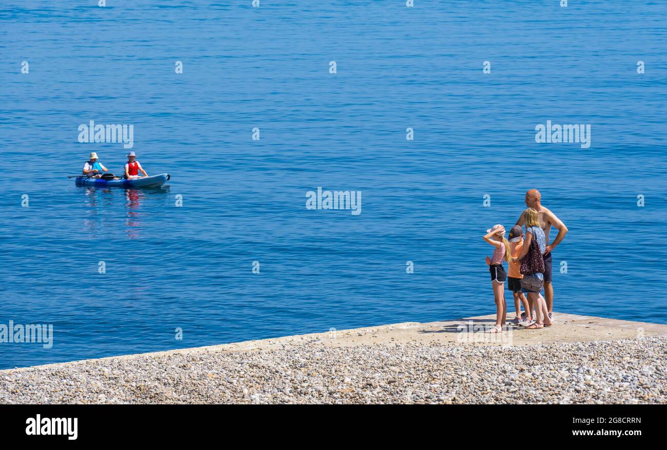Beer, East Devon; 19th July 2021. UK Weather: Holidaymakers enjoy the ...