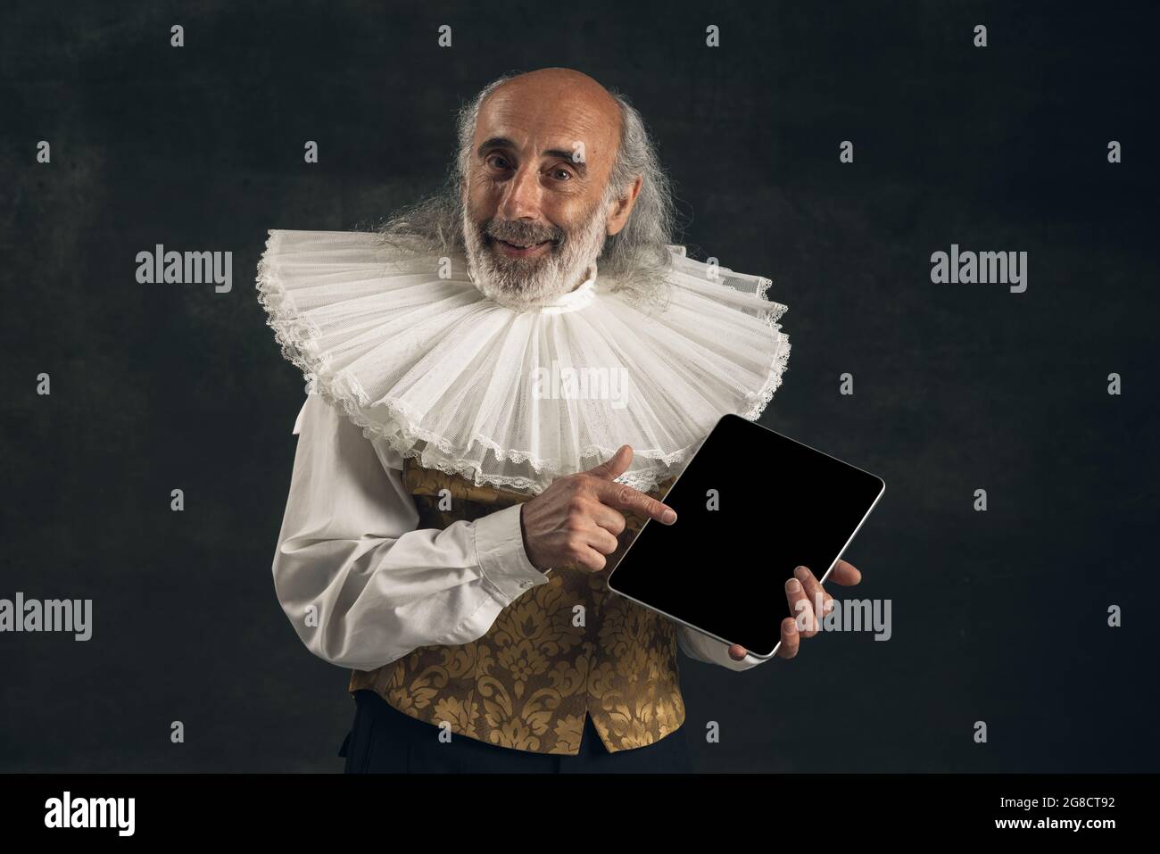 Portrait of elderly gray-haired man, medieval hystorical person, actor ...