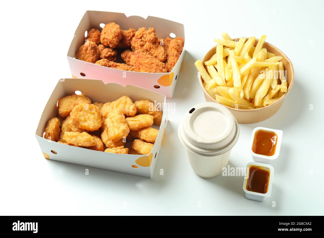 Concept of fast food on white background Stock Photo - Alamy