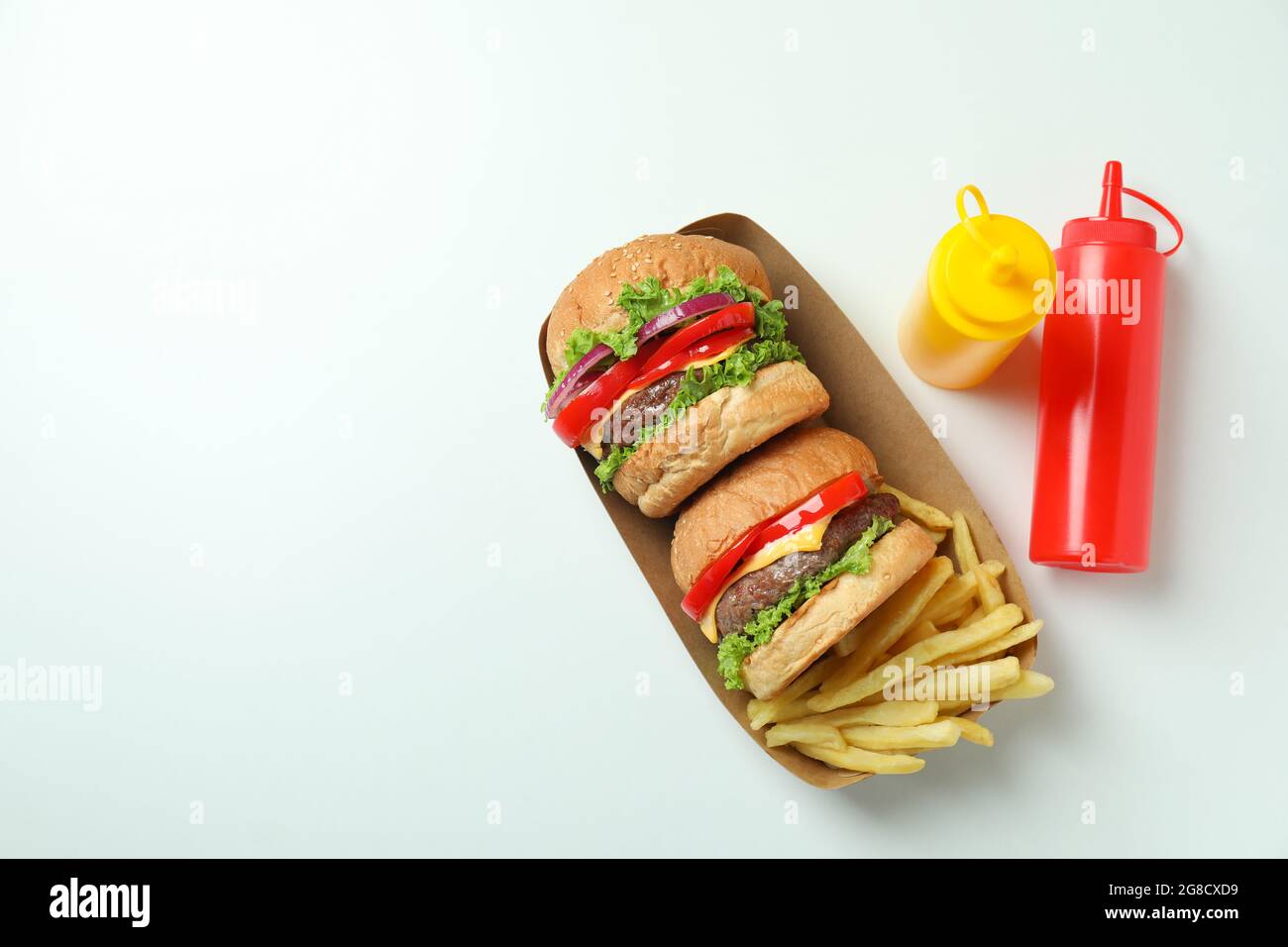 Concept of fast food on white background Stock Photo - Alamy