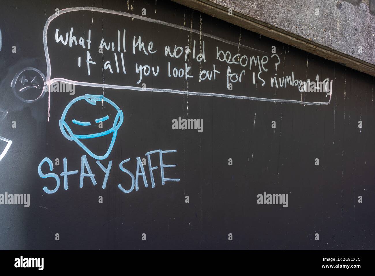 STAY SAFE - graffiti on a building facade in the city centre in ...
