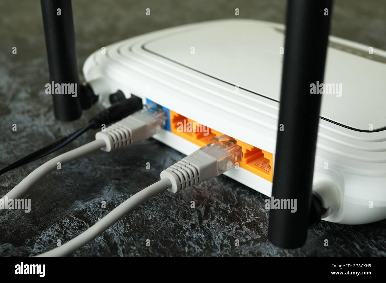Wi - fi router and connection cables, close up Stock Photo - Alamy