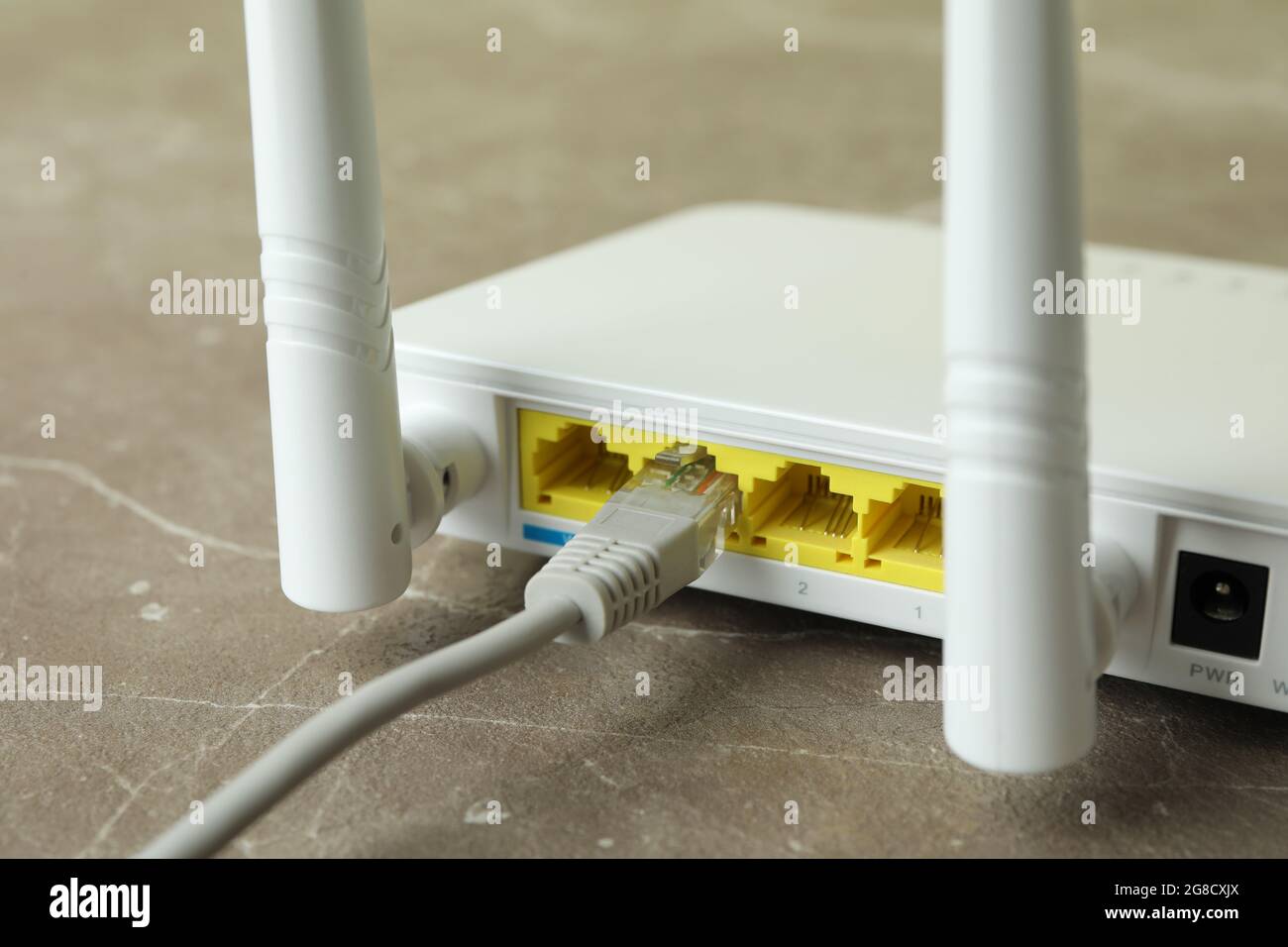 Wi-Fi router with external antennas on gray textured table Stock Photo ...