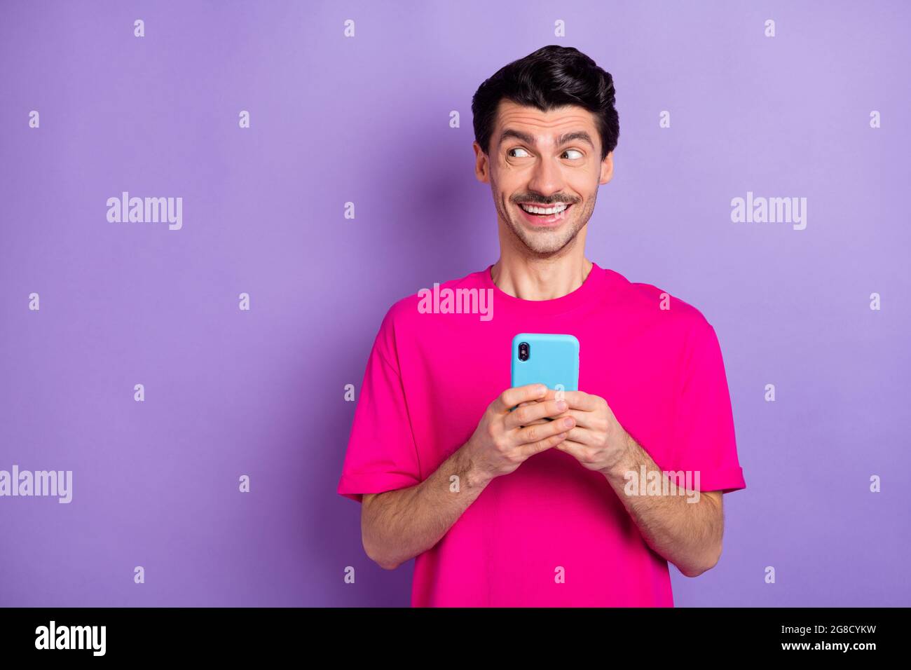 Photo of young happy cheerful smiling funky man blogger look copyspace ...