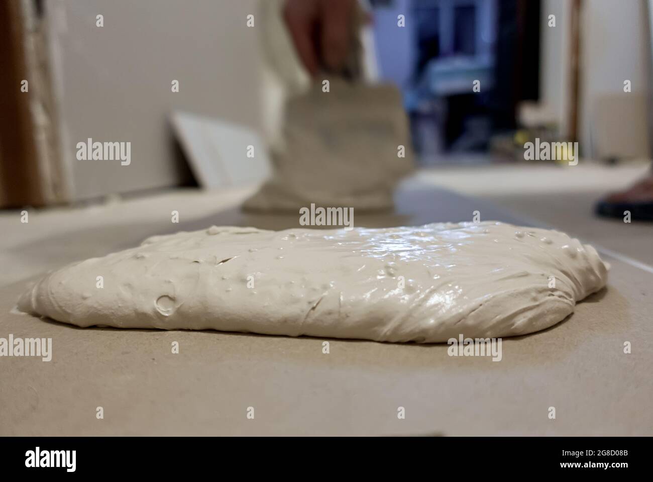 Plaster solution on the floor Stock Photo - Alamy