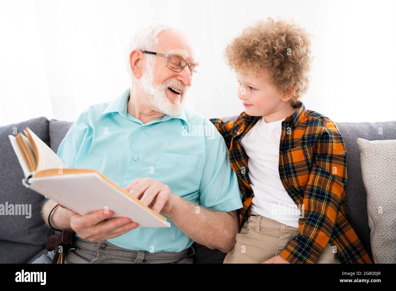 Grandparents and grandson playing at home - Family at home, grandfather ...