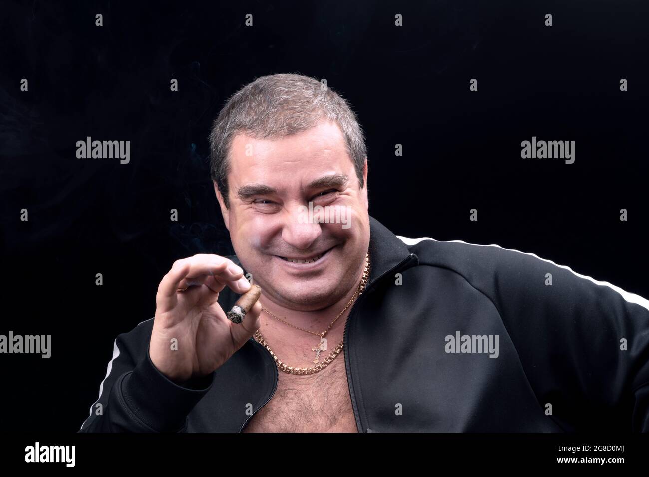 a kind, genuinely laughing white fat man, smoking a cigar. sincere ...