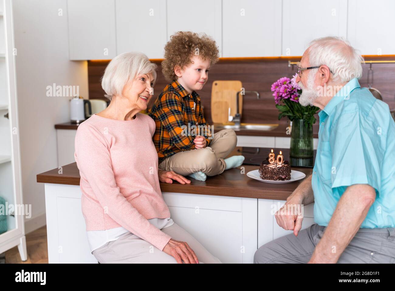 Grandparents and grandson playing at home - Family at home, grandmother ...