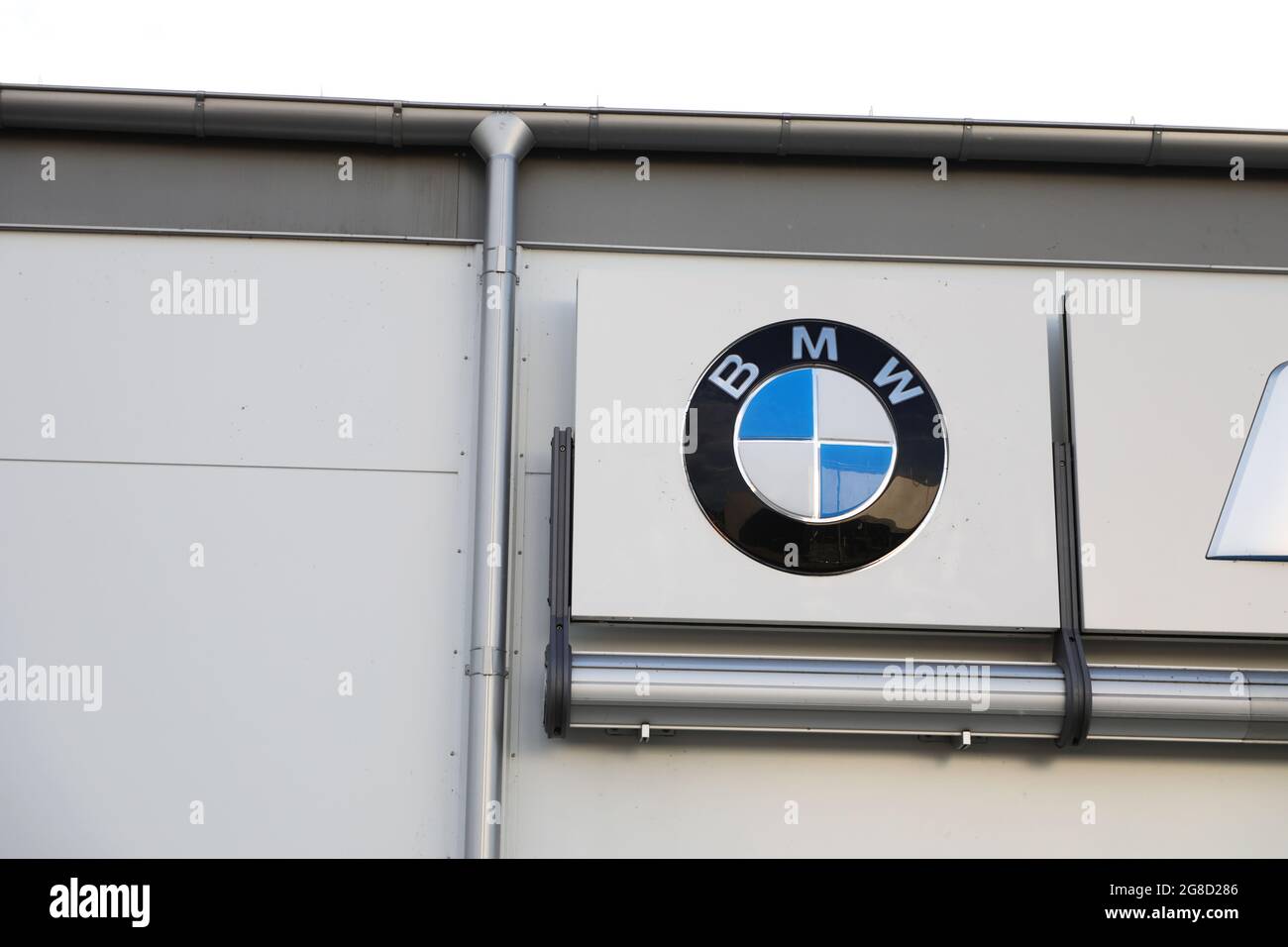 BMW logo at a BMW car dealership Stock Photo - Alamy